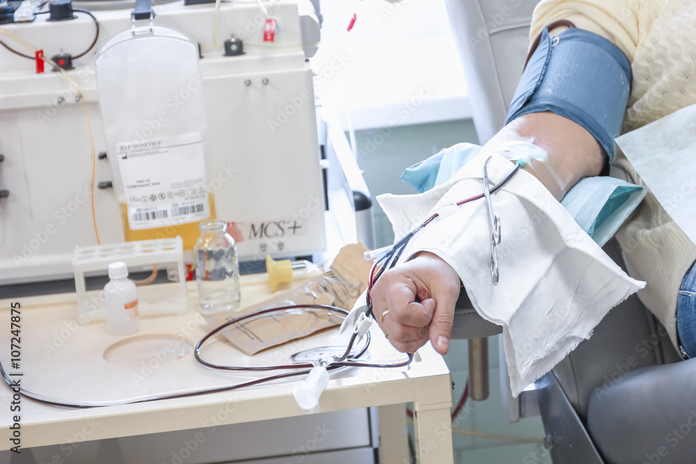 The process of blood collection from the donor. Medical device returns ...