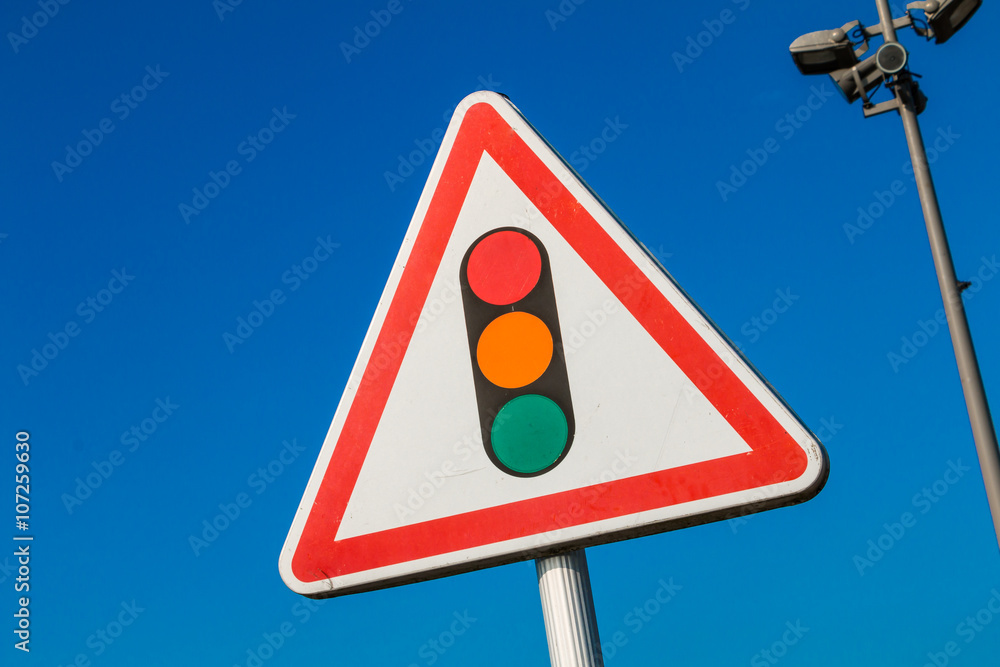 warning sign with a picture of a traffic signal Stock Photo | Adobe Stock