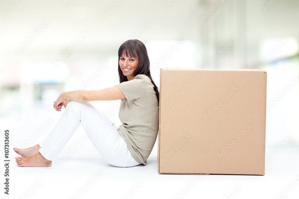 beautiful young girl hold a box in a interior background Stock Photo ...