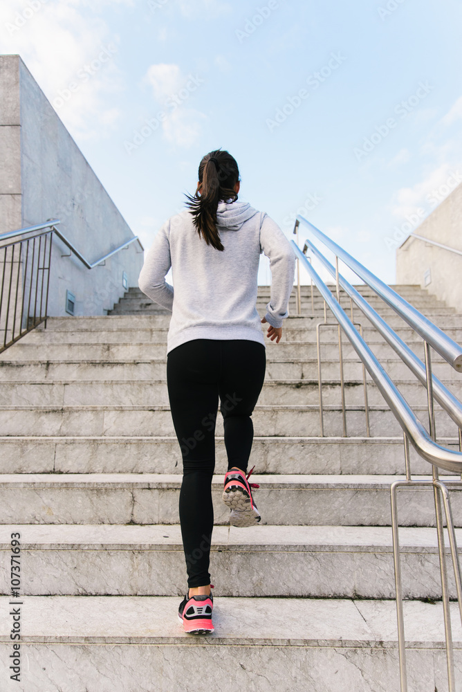 Woman Running Stairs