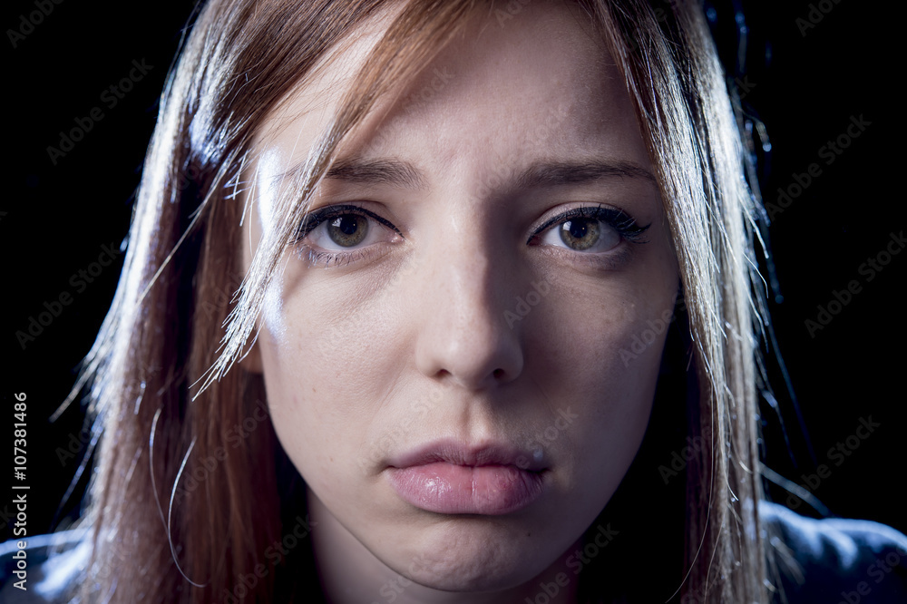 teenager girl in stress and pain suffering depression sad and scared in ...