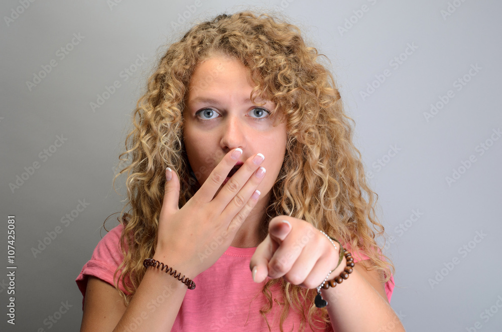 shocked woman looking surprised pointing finger at camera Stock Photo ...