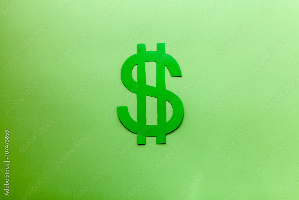 Green dollar symbol on a green background with a soft light Stock Photo ...