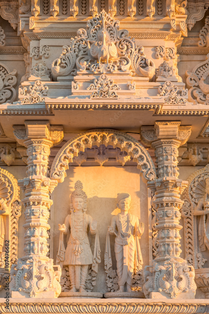 Facade of a hindu temple representing the god Swamy Narayan ...