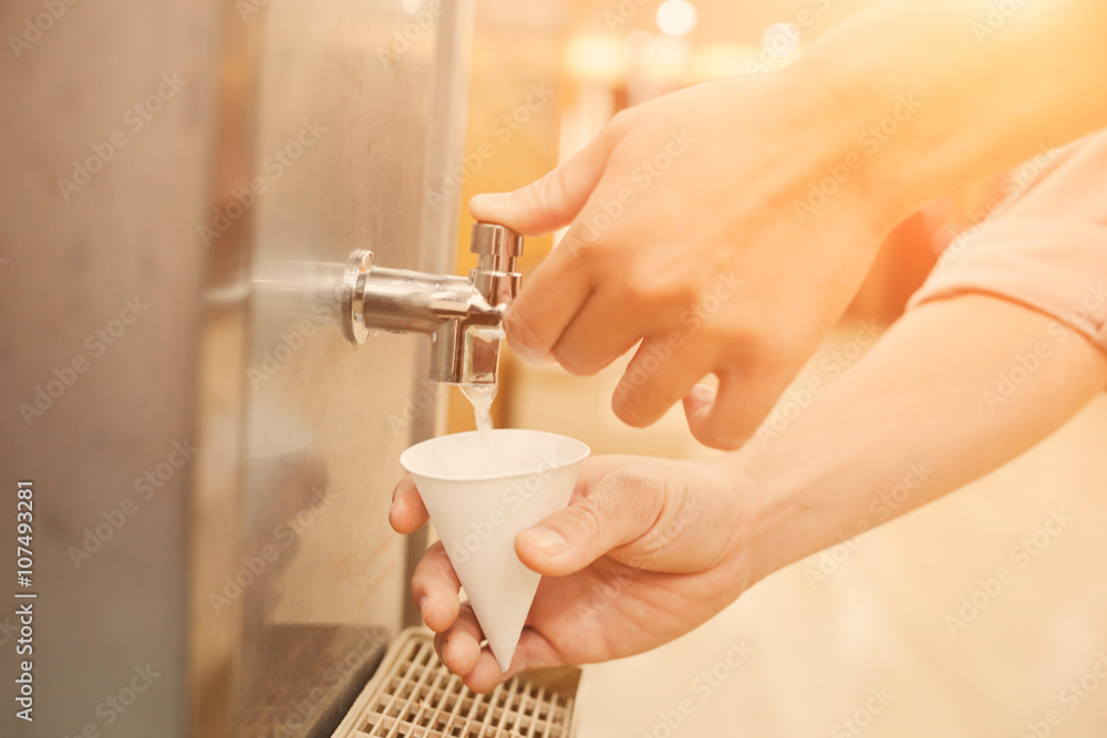 Drinking water from water box was poured into a glass paper cone Stock ...