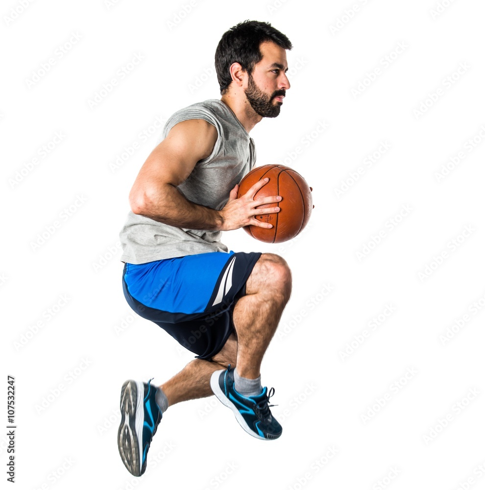 Man playing basketball jumping Stock Photo | Adobe Stock