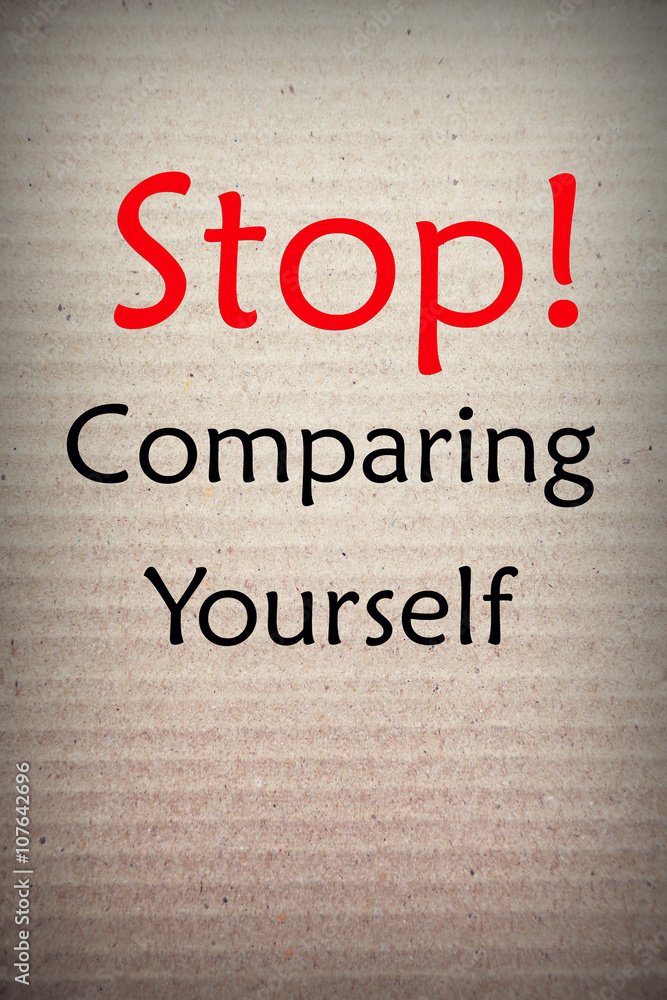 Stop comparing yourself word on cardboard background Stock Photo ...