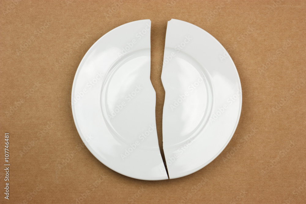 Broken plate on cardboard background Stock Illustration | Adobe Stock