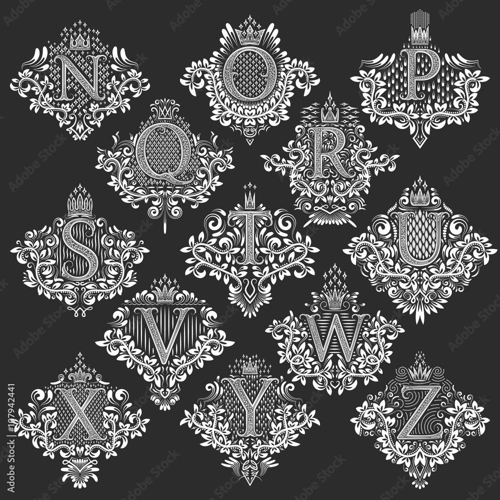 Set of heraldic monograms in coats of arms form. White floral ...