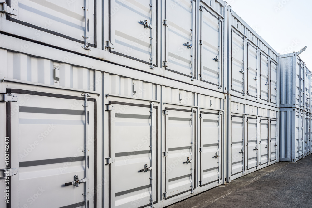 Line of shipping containers stack. They are suitable to withstand ...