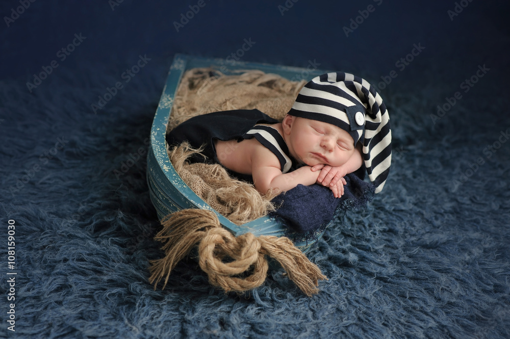 Newborn Baby Boy Sleeping in a Boat Stock Photo | Adobe Stock