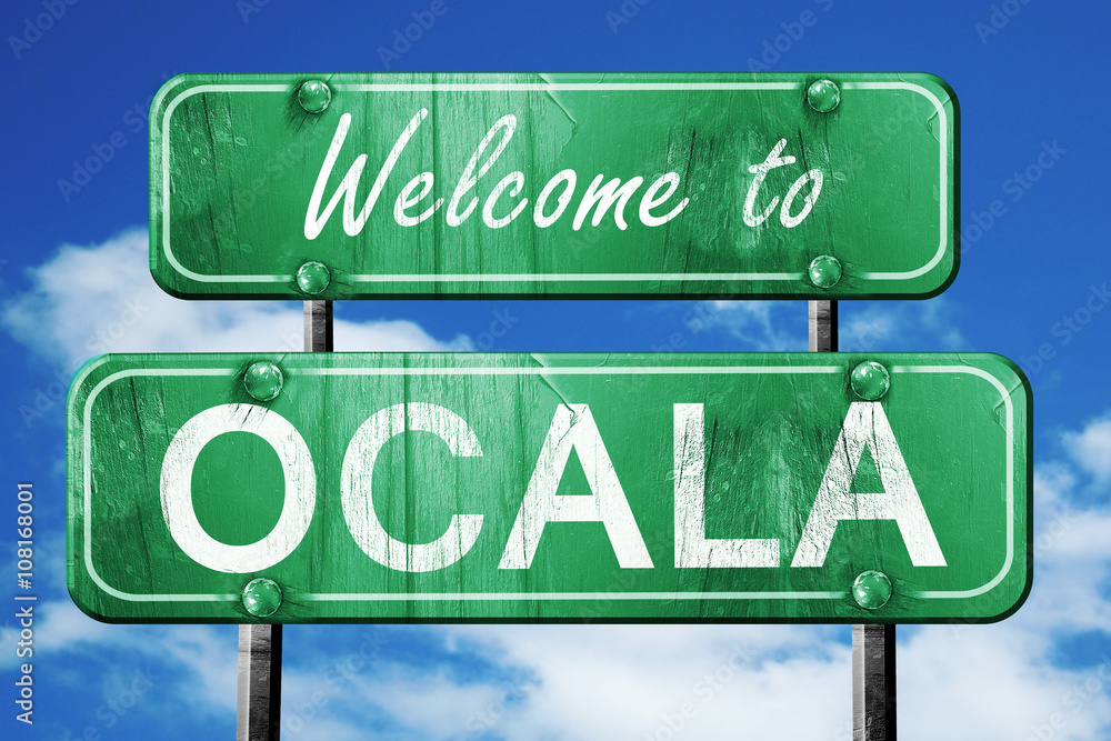 ocala vintage green road sign with blue sky background Stock ...