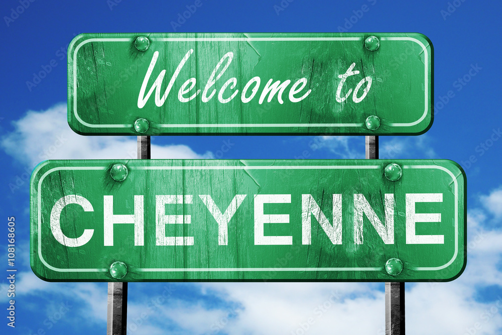 cheyenne vintage green road sign with blue sky background Stock ...