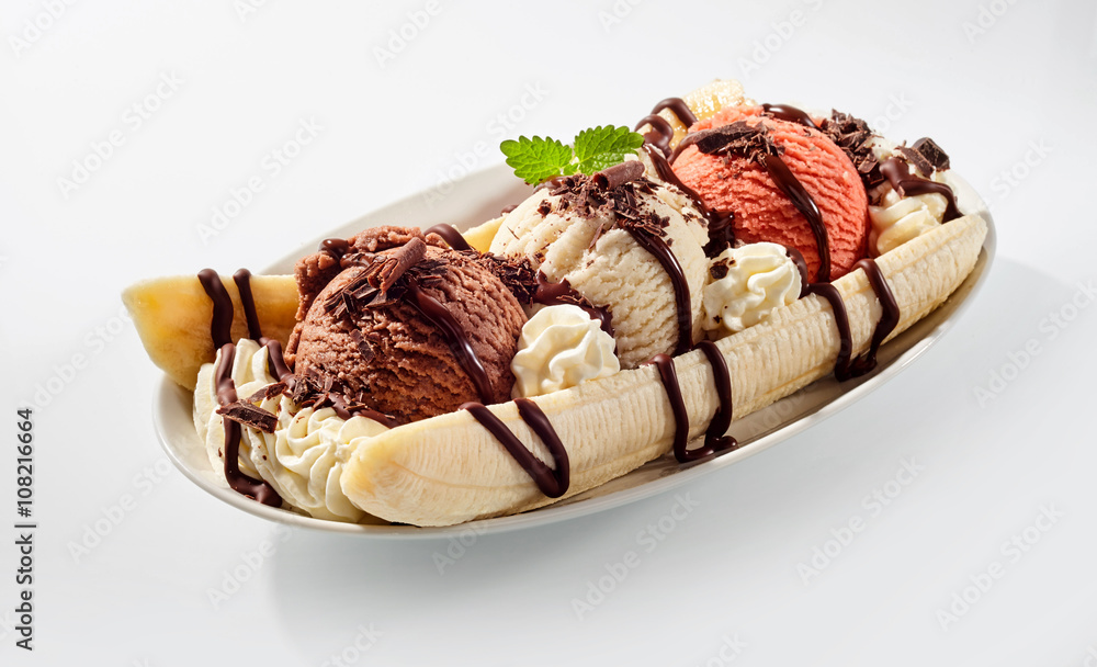 Delicious sweet banana split in bowl Stock Photo | Adobe Stock