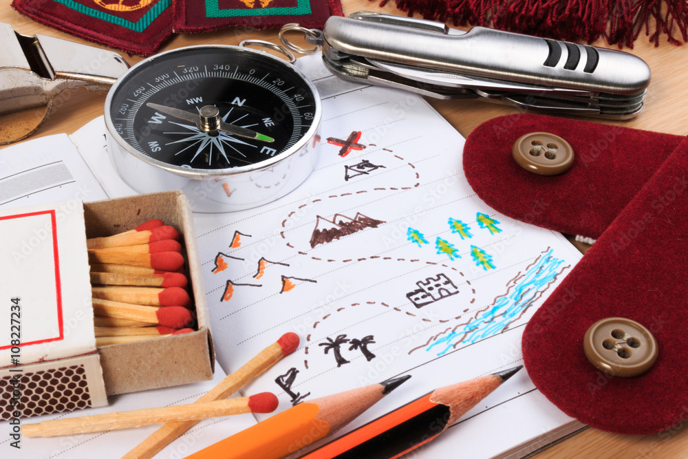 A set of various camping equipment. Boy scout with camping tourist ...