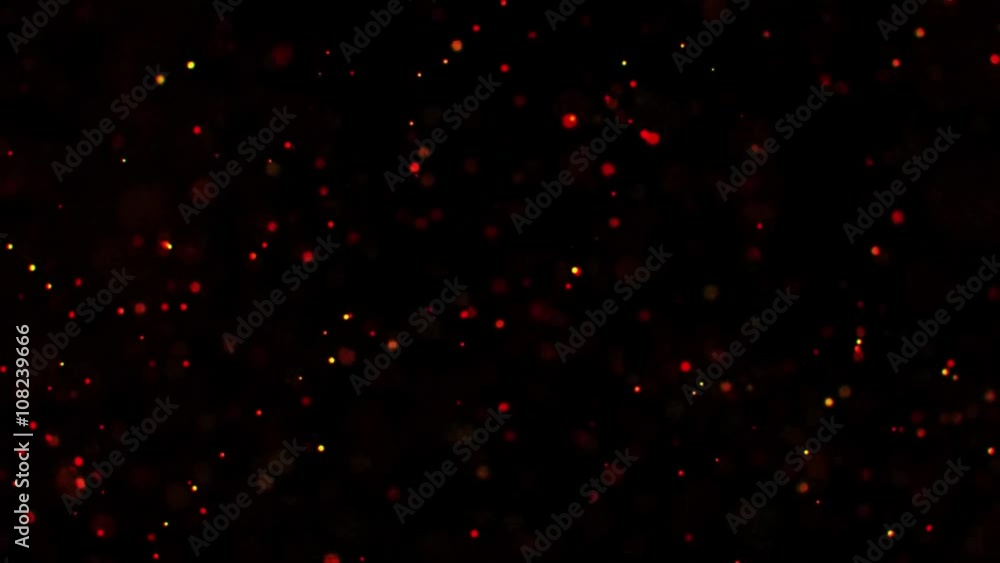 Dust particle clouds are orange and red. Blurry particles on the black ...