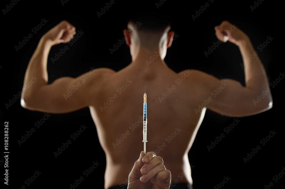 strong back of young body building sportsman using steroids for ...