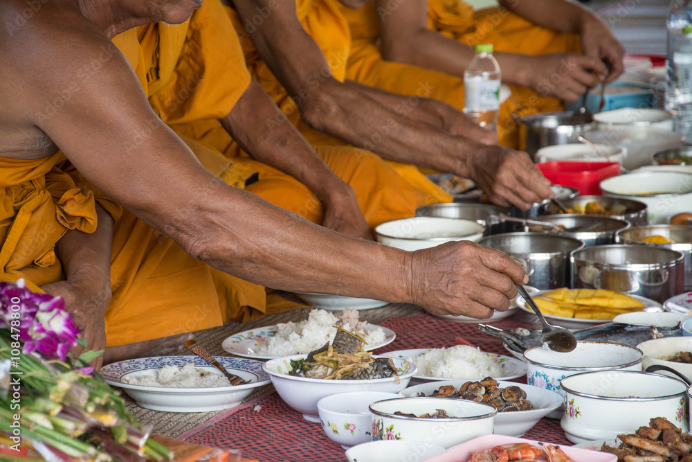 food and drink for monks in traditional religious ceremony in a temple ...