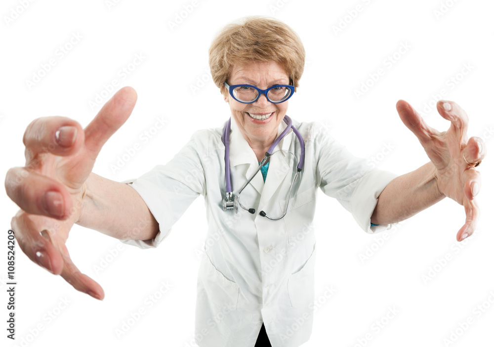 Mad senior female doctor stretching hands to camera with smile ...