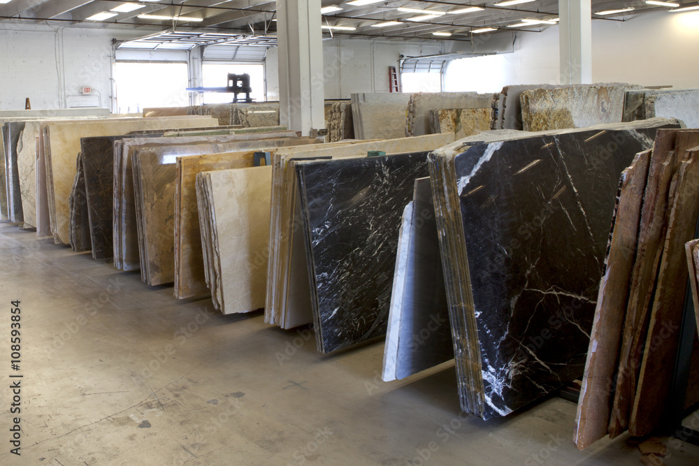 Slabs of granite in a storage warehouse. Construction Material Stock ...