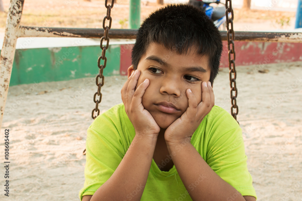 Child Alone In Playground