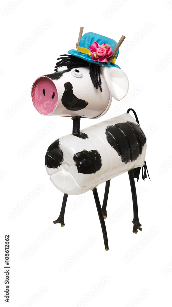 Recycling: a cow made of plastic bottle and a cup isolated on white ...