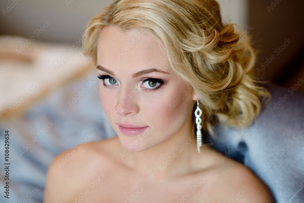 Beauty bride in bridal gown with lace veil indoors. Beautiful model ...