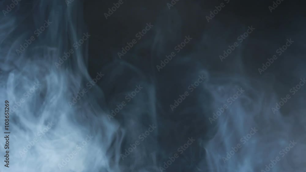 Smoke abstract. Smoke cloud. Smoke on black background in blue light ...