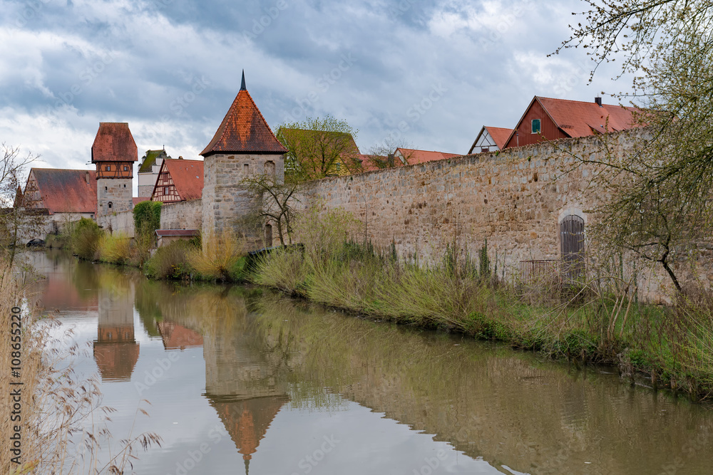 Old city wall with tower and moat Stock Photo | Adobe Stock