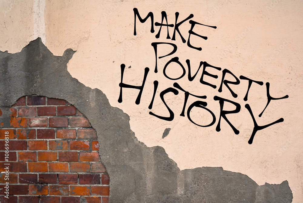 Handwritten graffiti Make Poverty History sprayed on the wall ...