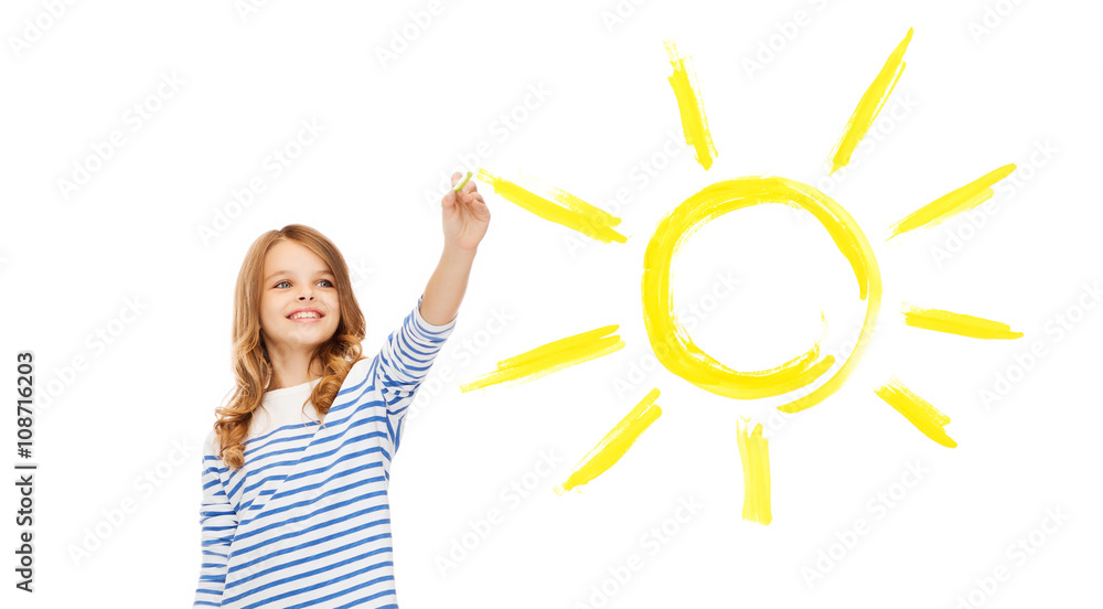 girl drawing big sun in the air Stock Photo | Adobe Stock