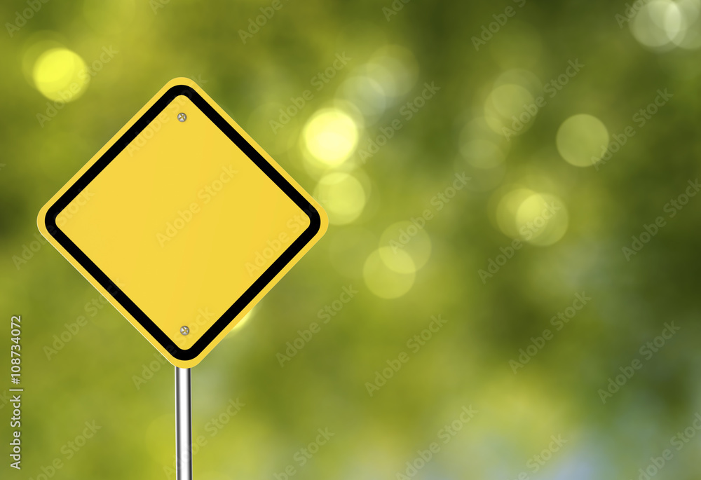 blank warning sign on greenery background Stock Photo | Adobe Stock