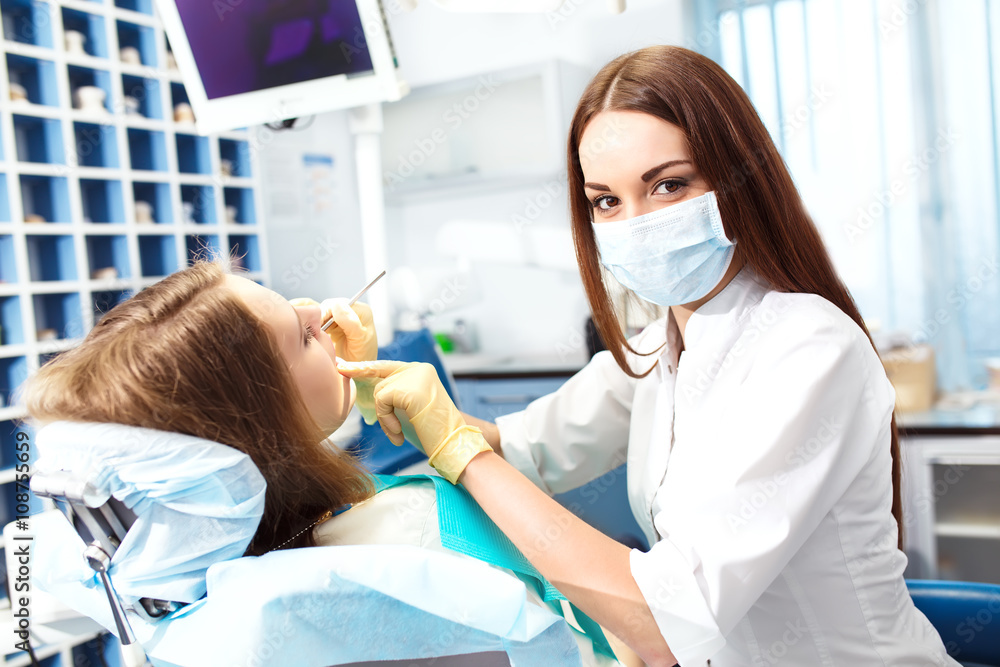 Professional woman dentist doctor working . woman at dental clinic ...