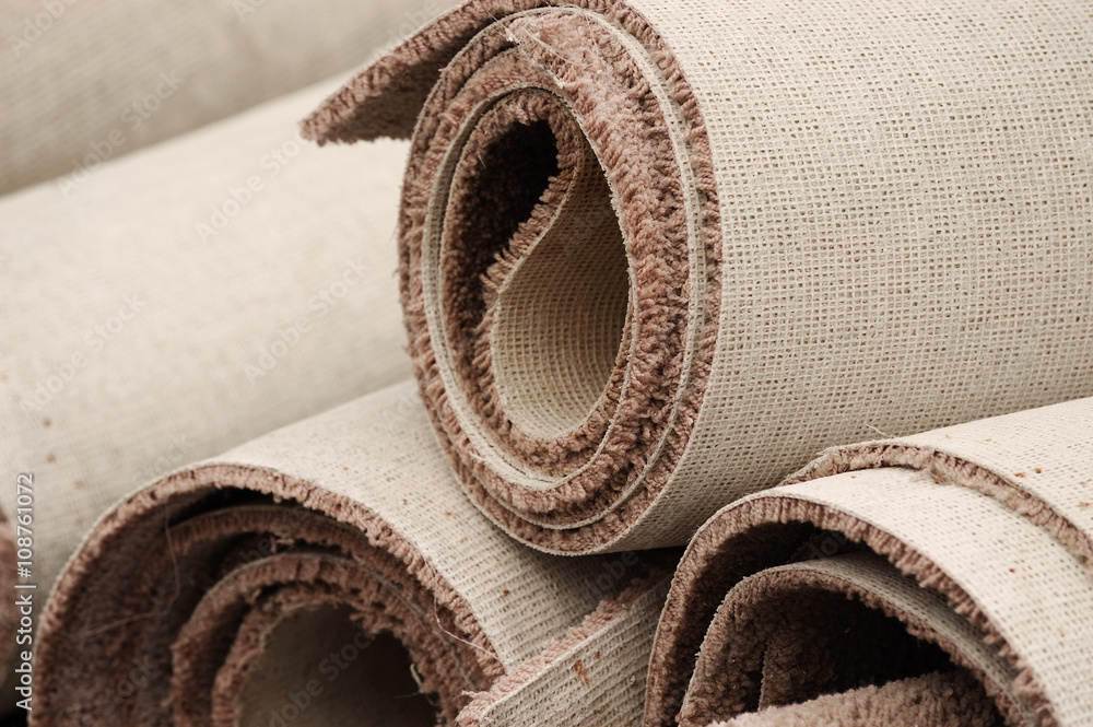 stacking carpet rolls Stock Photo | Adobe Stock