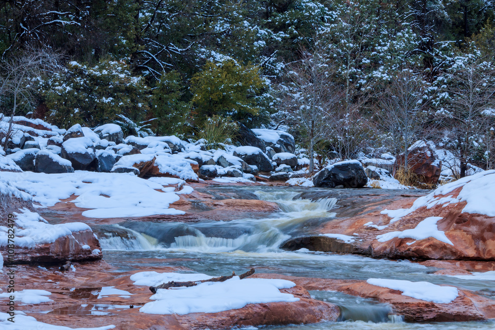 Icy creek in Sedona, Arizona, swollen with runoff from melting snow ...