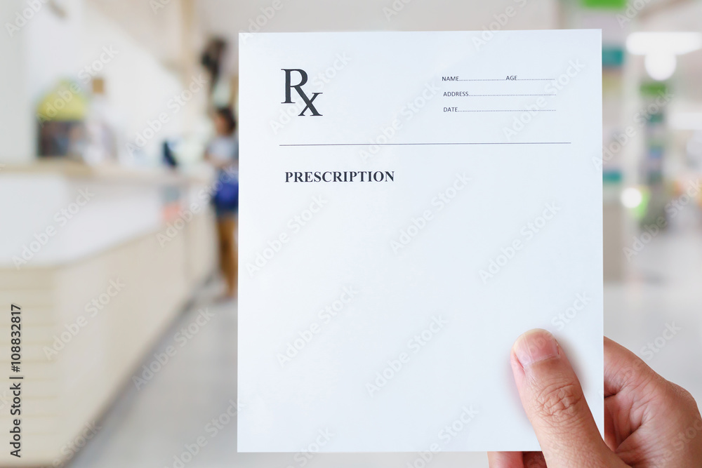 hand hold prescription paper with hospital background Stock Photo ...