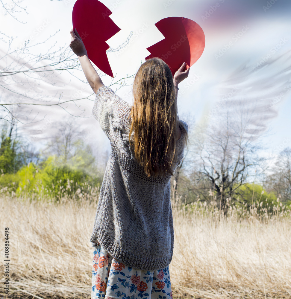 Sad angel with a broken heart Stock Photo | Adobe Stock