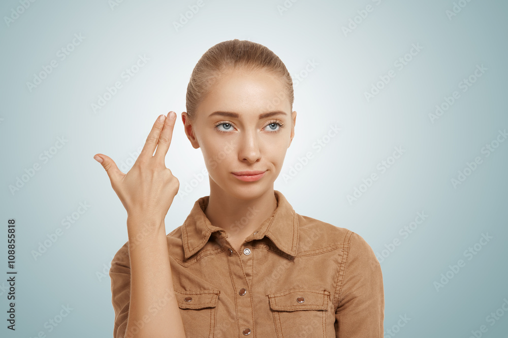 Isolated headshot of young woman committing suicide with finger gun ... Isolated headshot of young woman committing suicide with finger gun ...