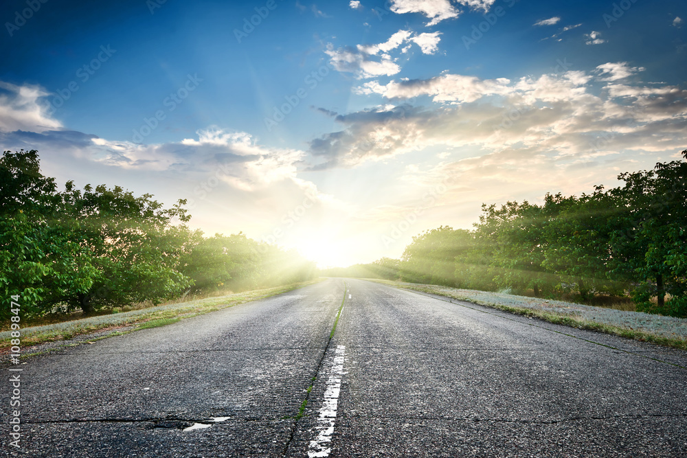 highway road at sunset, travel and transportation concept, cloudy sky ...