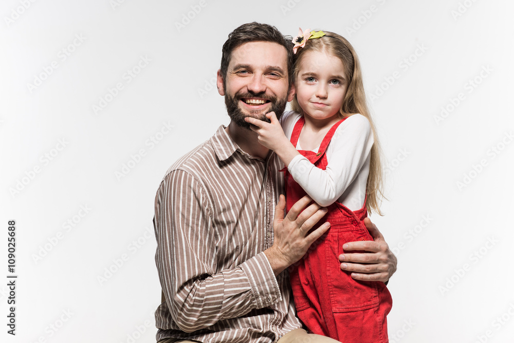 Girl hugging her father over a white background Stock Photo | Adobe Stock