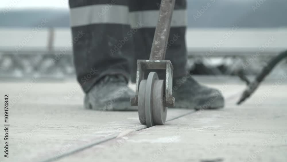Concrete blocks seam sealing or joint sealing process. Slow motion ...