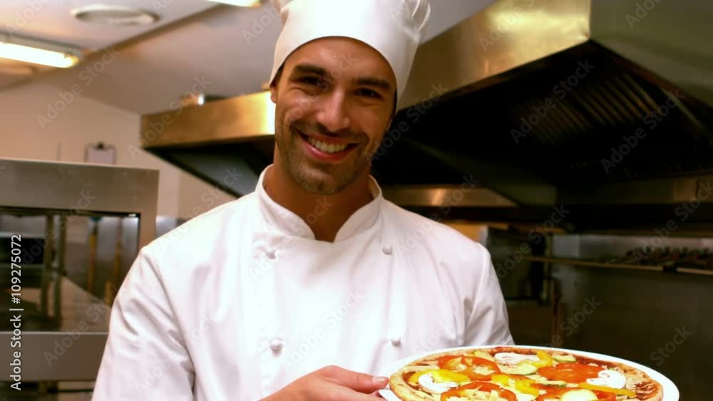 Chef holding a pizza Stock-Video | Adobe Stock