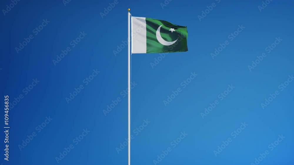 Pakistan flag waving in slow motion against clean blue sky, seamlessly ...