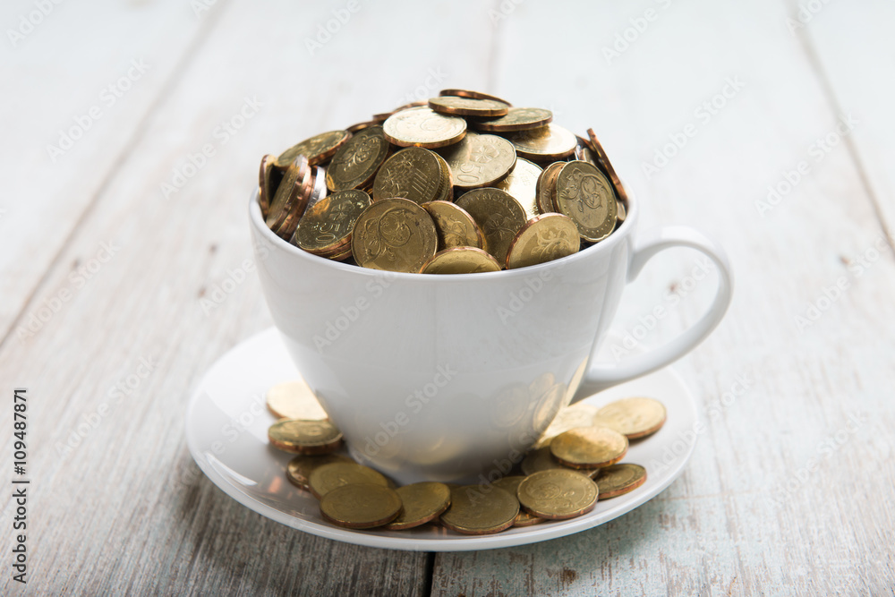 cup of coffee with gold coins of malaysian ringgit Stock Photo | Adobe ...