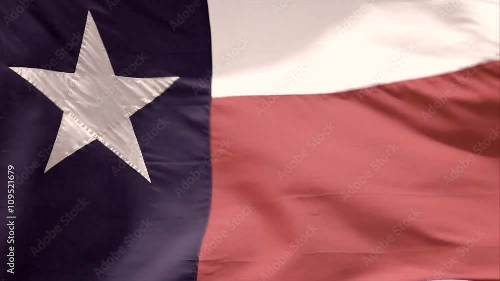 Faded Texas state flag flying in the wind, full frame close-up ...