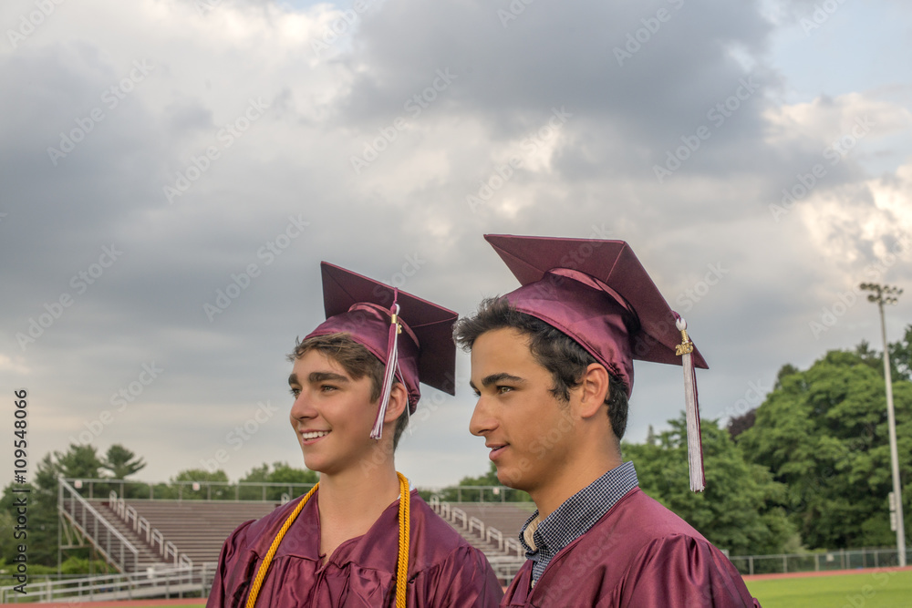 Portrait of two young men at graduation ceremony Stock Photo | Adobe Stock