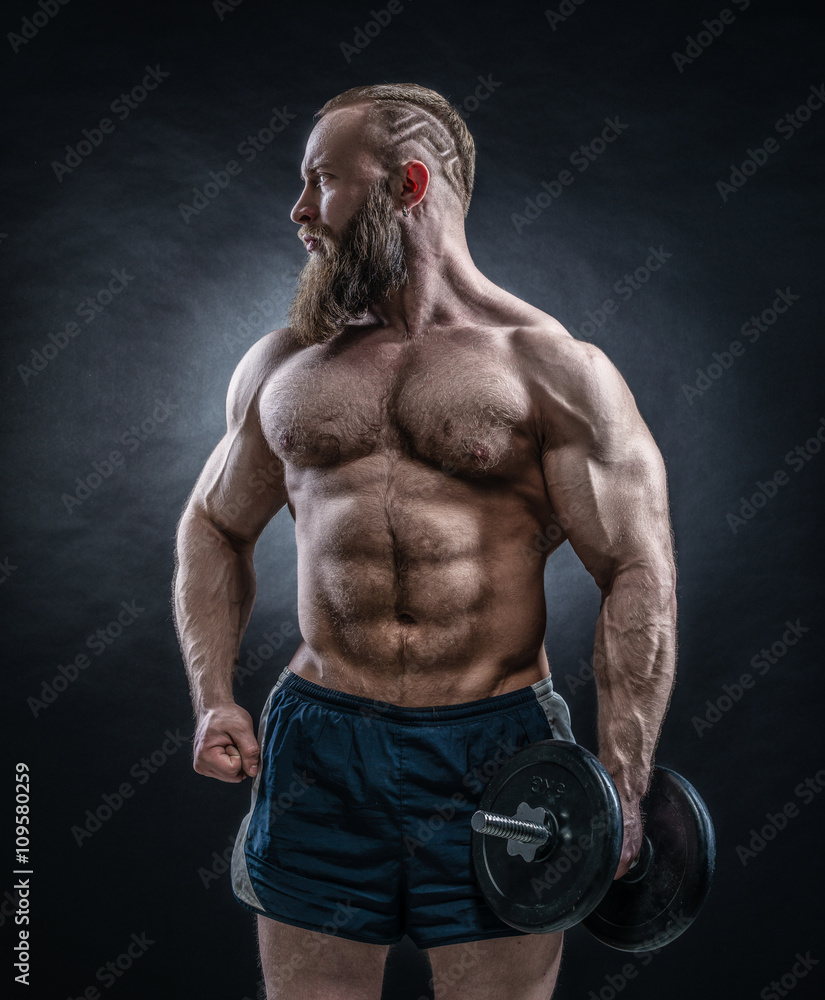 Strong bodybuilder with six pack, perfect abs, shoulders, biceps Stock ...