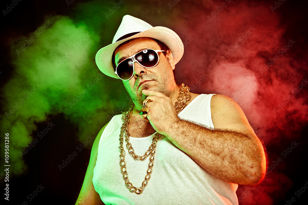 italian funny mafia boss rapper with undershirt and sunglasses on smoky ...