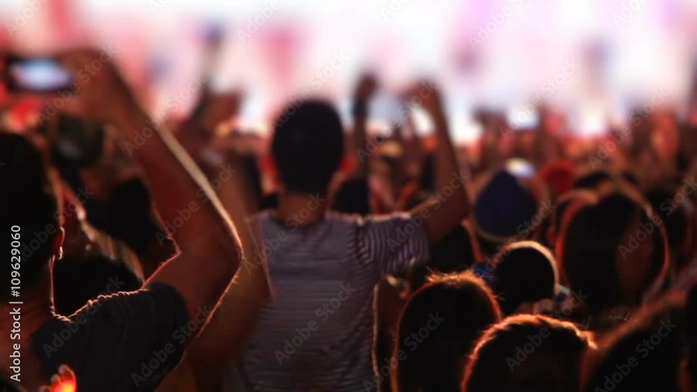 Crowd of young fans jumping at concert Stock Video | Adobe Stock