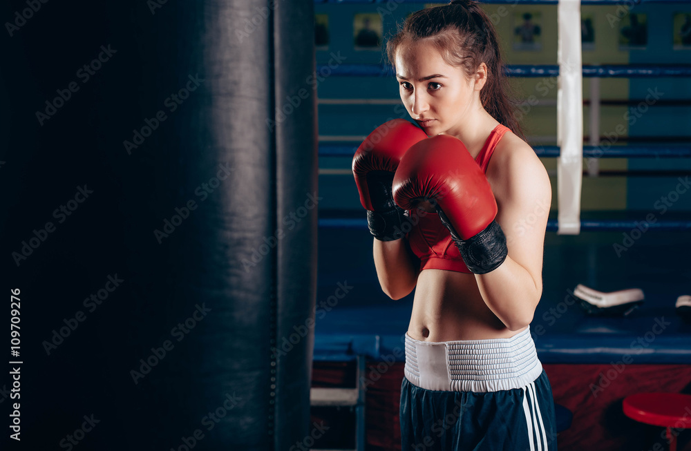 young boxing girl doing exercises on a boxing ring Stock Photo | Adobe ...
